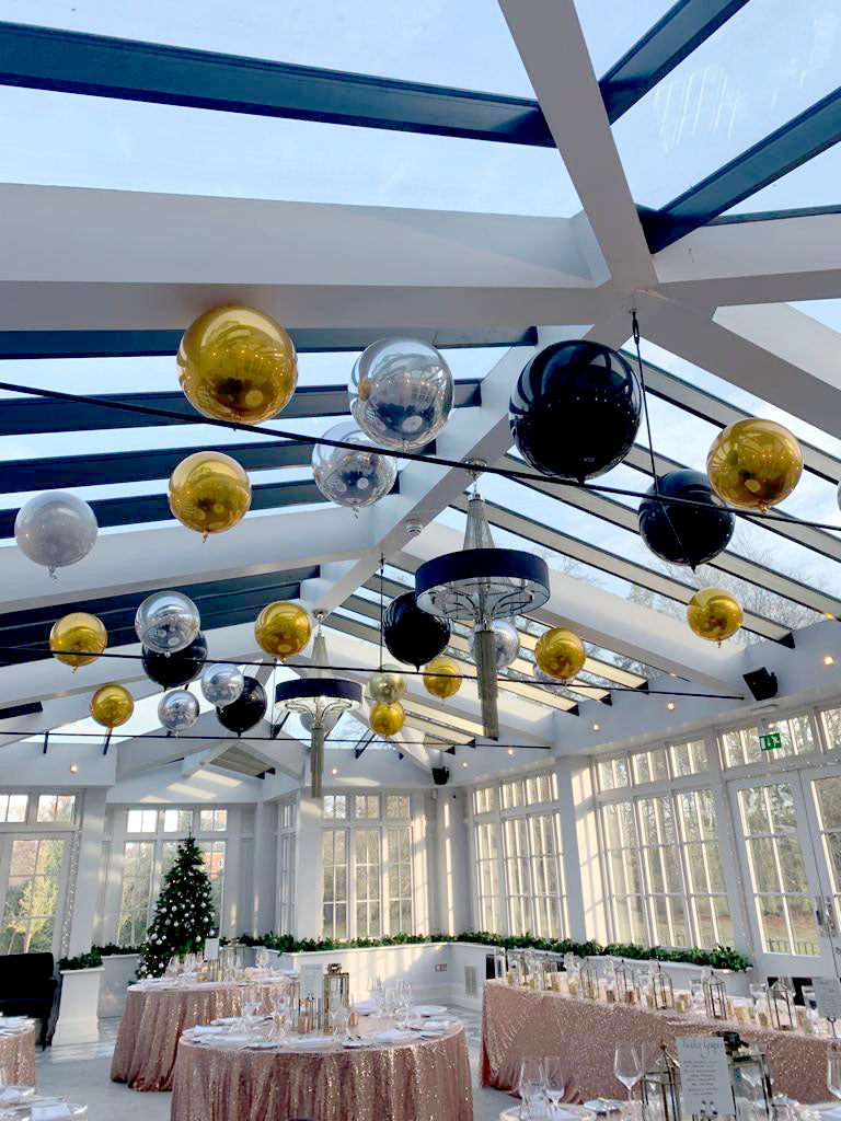 Gold, Silver and Black Orb Ceiling Installation – beautiful balloons
